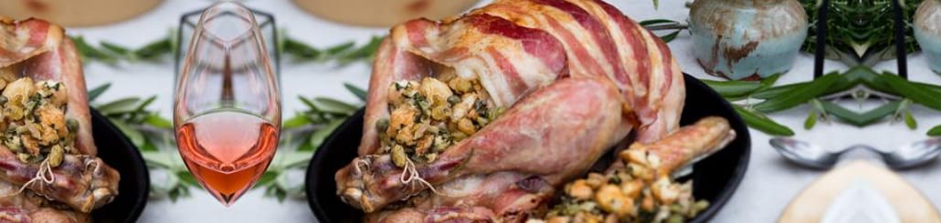 Delicious Walnut and Raisin Stuffed Turkey Wrapped in Bacon Recipe